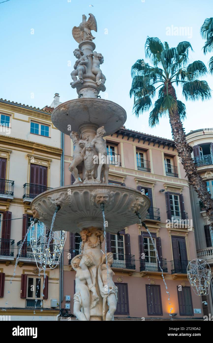Water fountain in the Plaza de la Constitucion in the city of Malaga ...