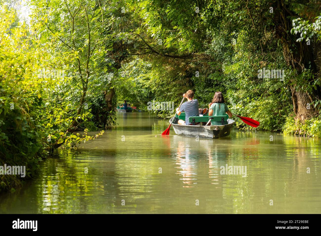 A young couple rowing the boat sailing between La Garette and Coulon ...