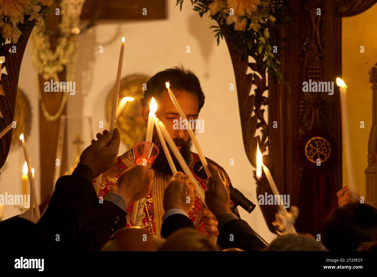 Pope lights the Holy Light, candles, hands, Pope, midnight service ...