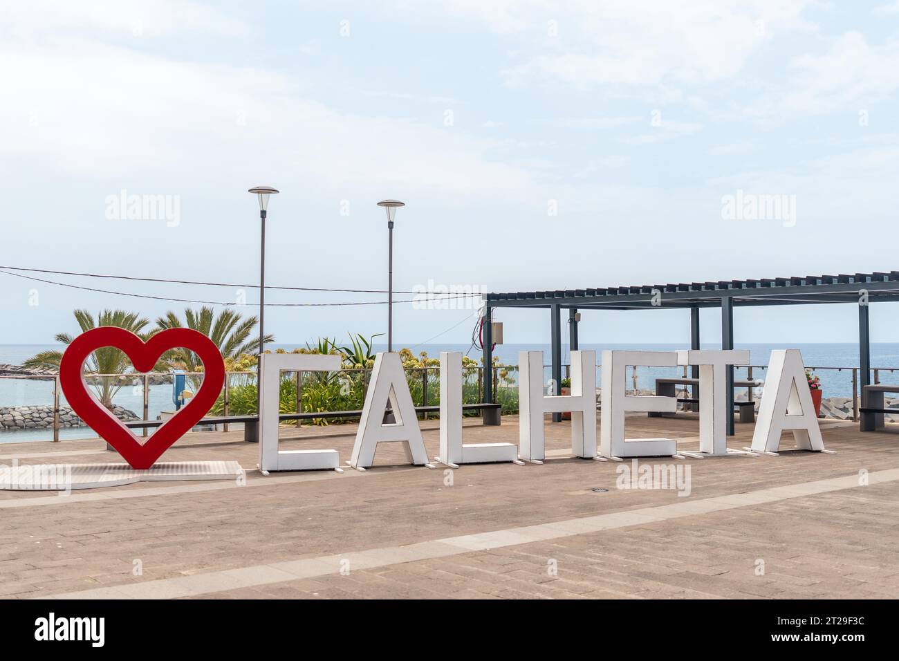 Praia da Calheta in summer, letters of the name of the town on the ...