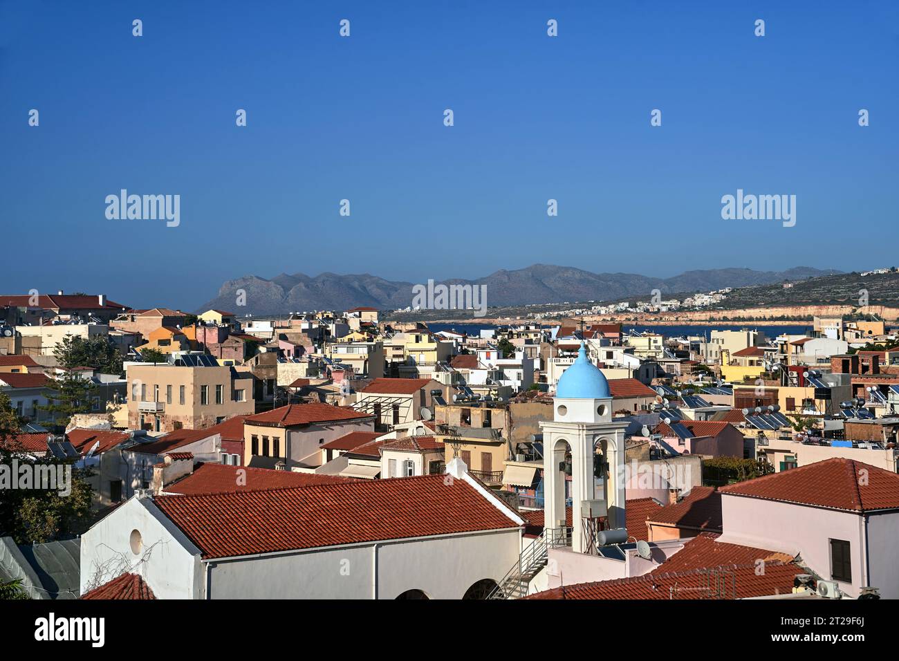 roofs of houses and the bell tower of the church in the city of Chania ...