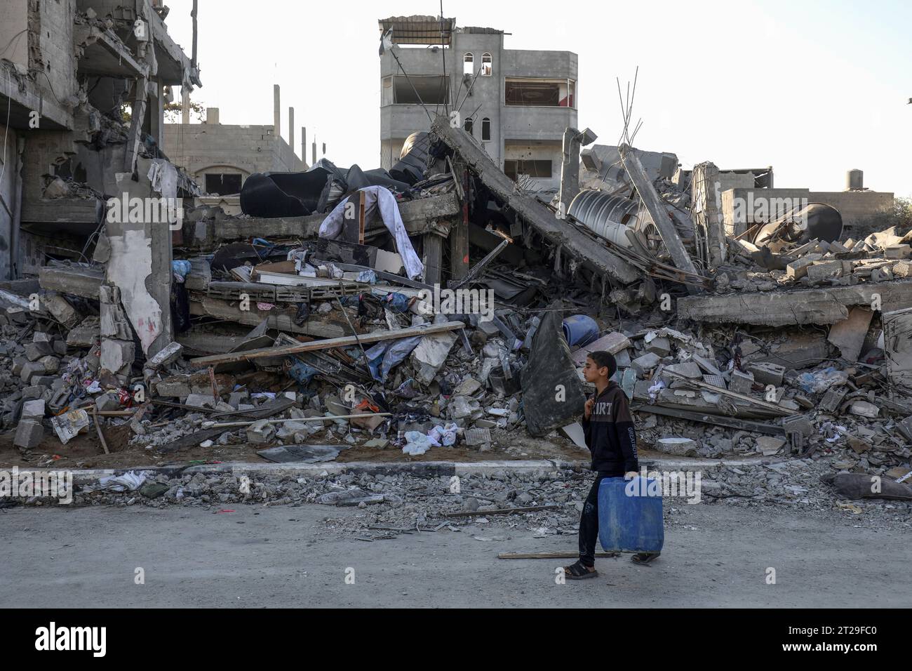 Rafah, Palestinian Territories. 18th Oct, 2023. A Palestinian boy walks ...