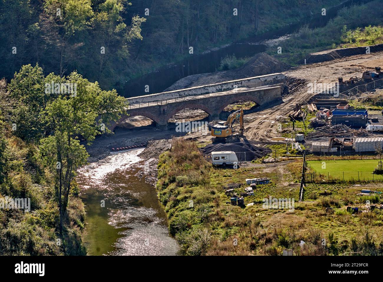 Marienthal, Germany. 17th Oct, 2023. Heavy equipment is used to rebuild ...