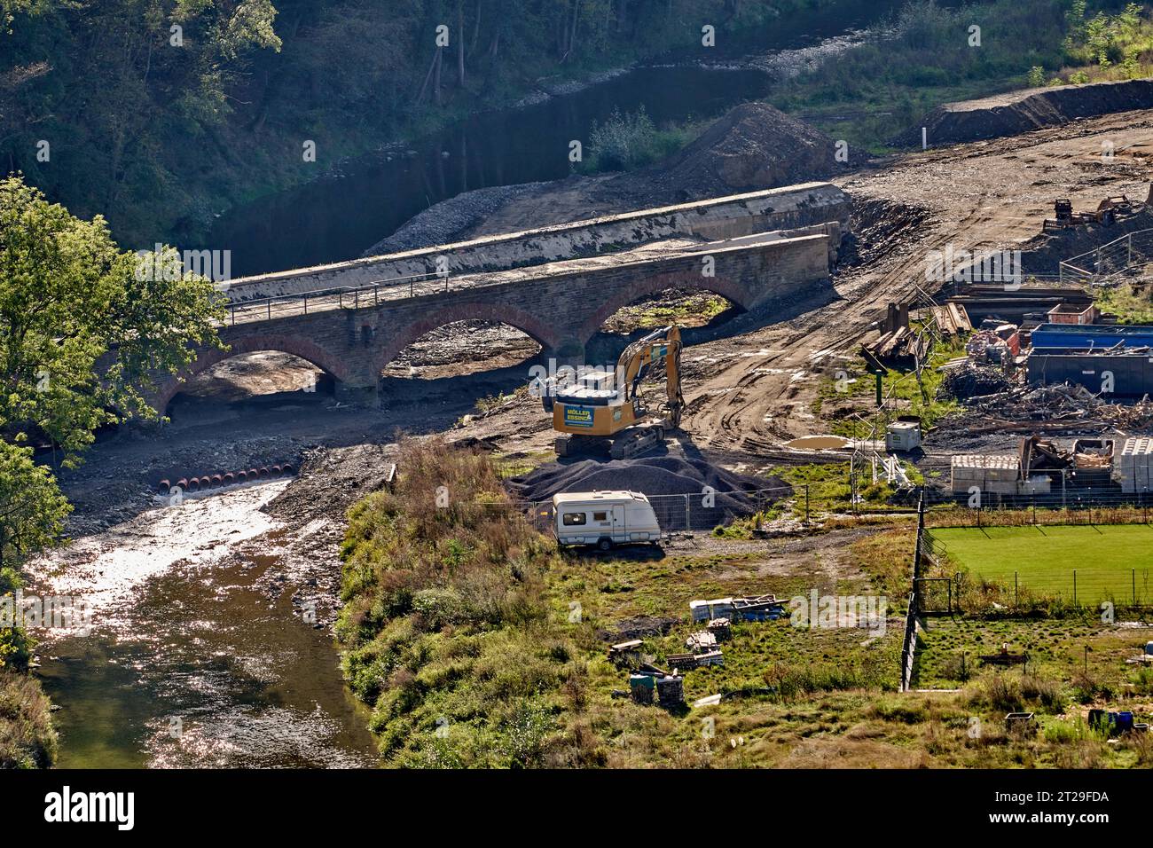 Marienthal, Germany. 17th Oct, 2023. Heavy equipment is used to rebuild ...