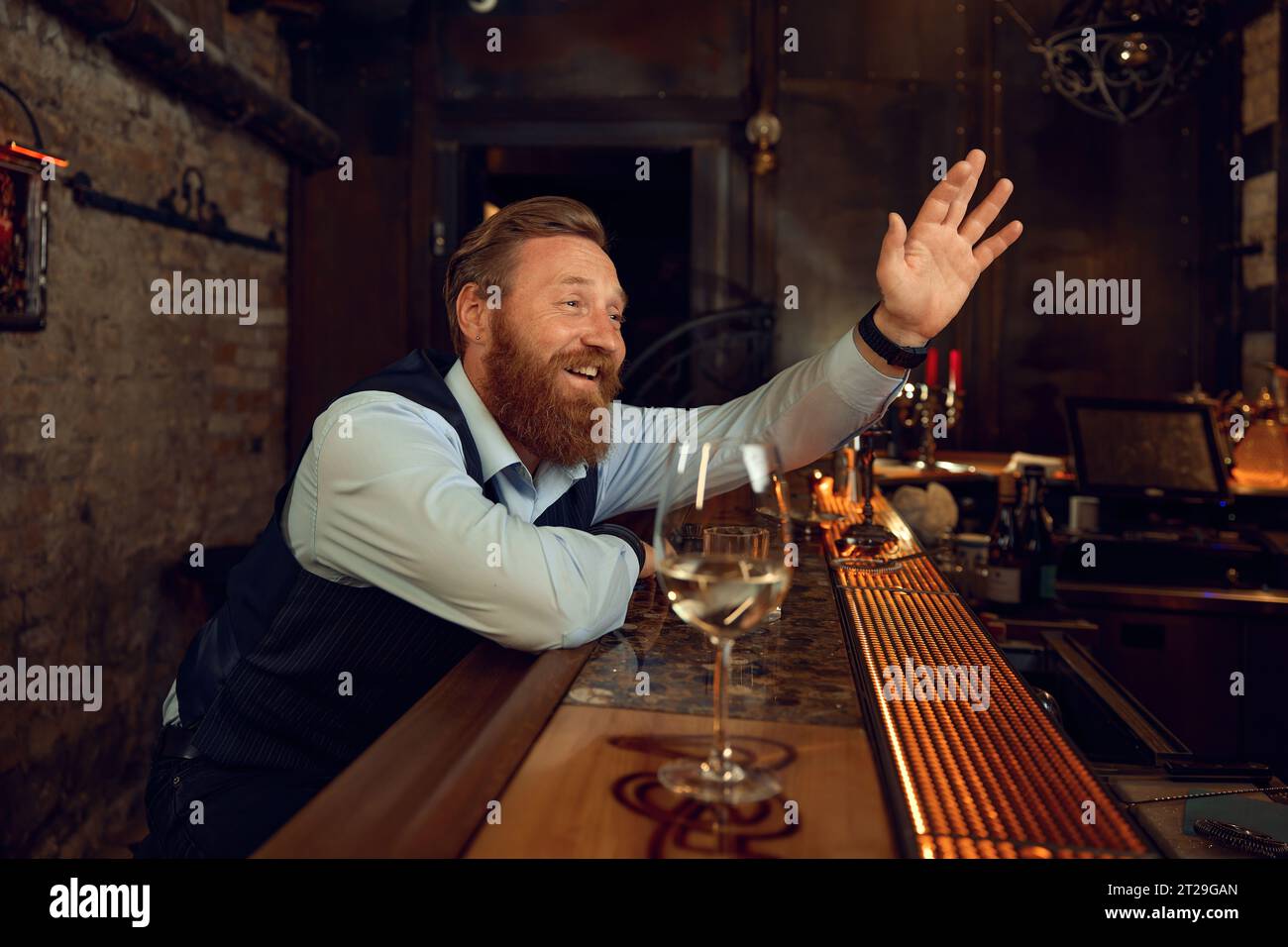 Bartender waving hi-res stock photography and images - Alamy