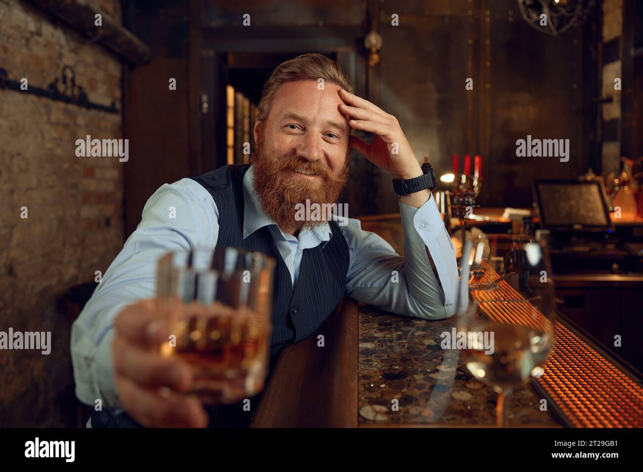 Portrait of happy smiling drunk man clinking with glass to camera Stock ...
