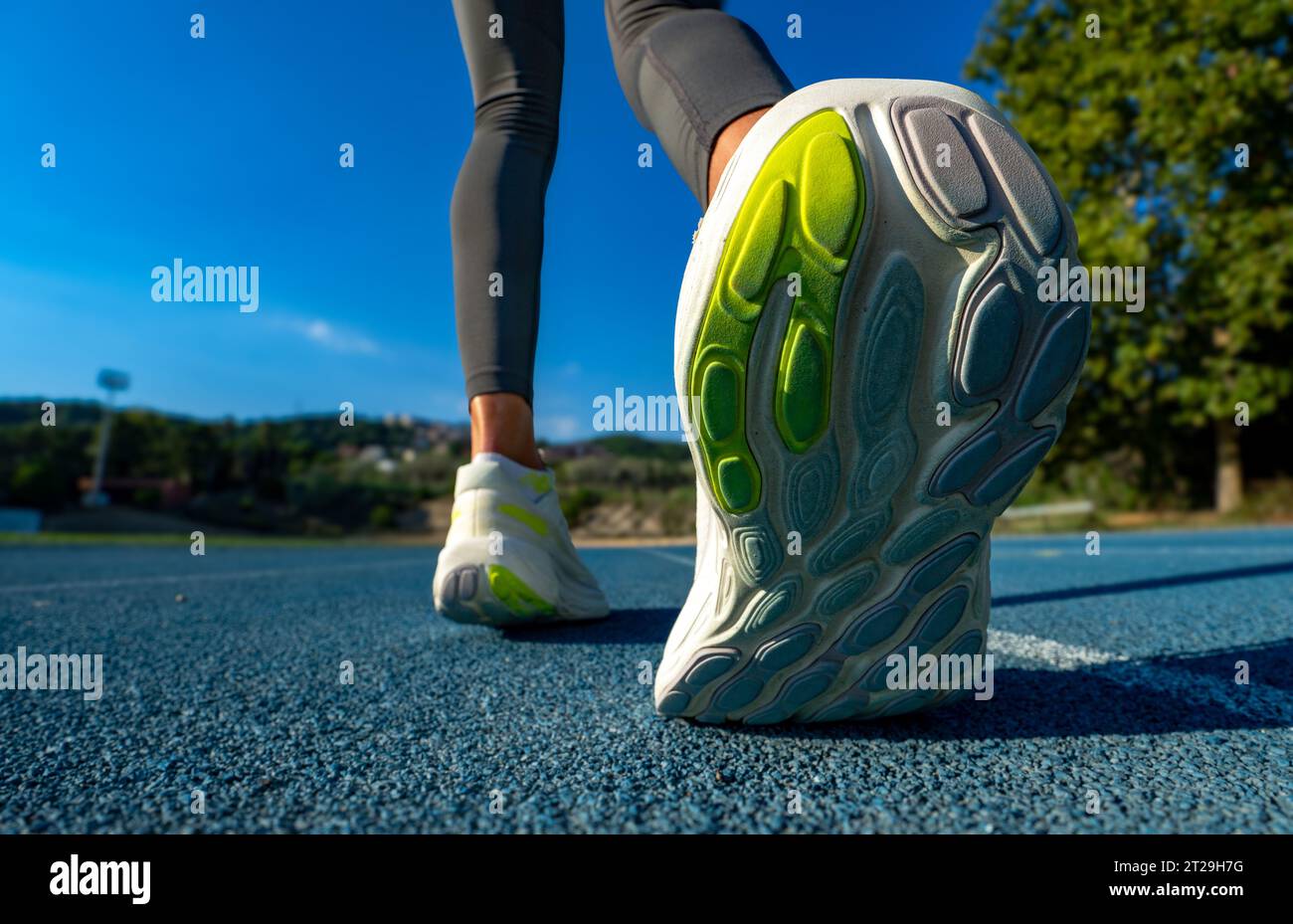 Close-up high angle view of the sole of a flexed running shoe of a ...