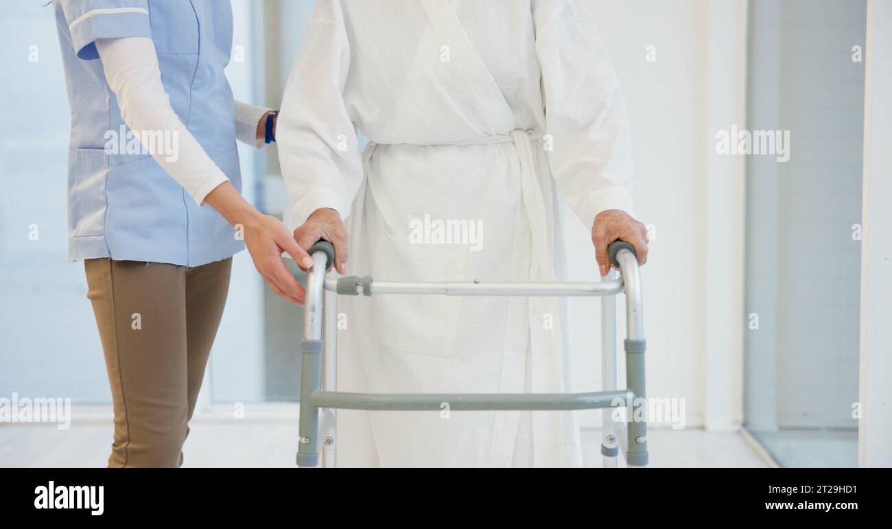 Nurse, senior woman and walker for helping hand, show support and guide ...