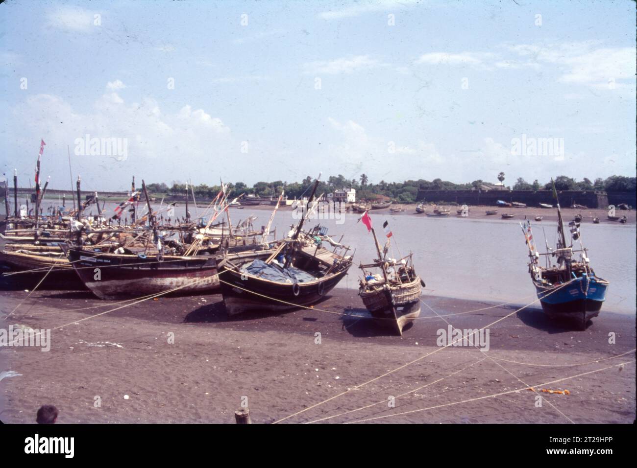 Small Ships Tide on Coast of Daman Ganga, India Stock Photo - Alamy