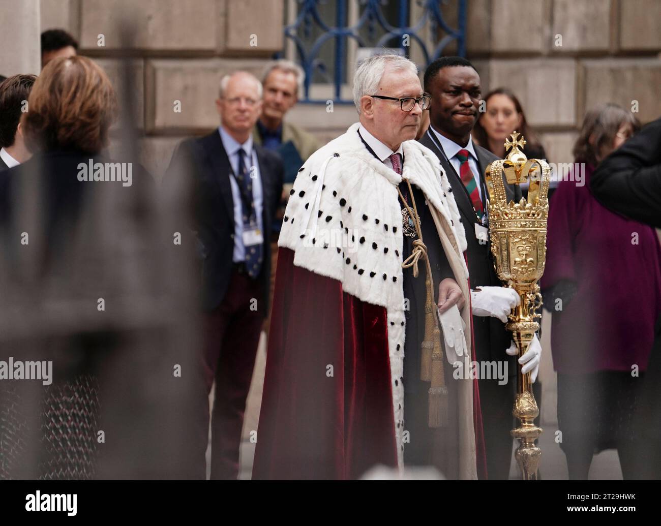Outgoing Lord Mayor of London Nicholas Lyons (centre) stands next to ...