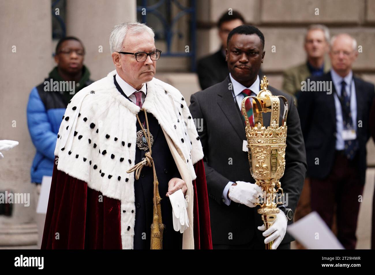 Outgoing Lord Mayor of London Nicholas Lyons (left) stands next to the ...