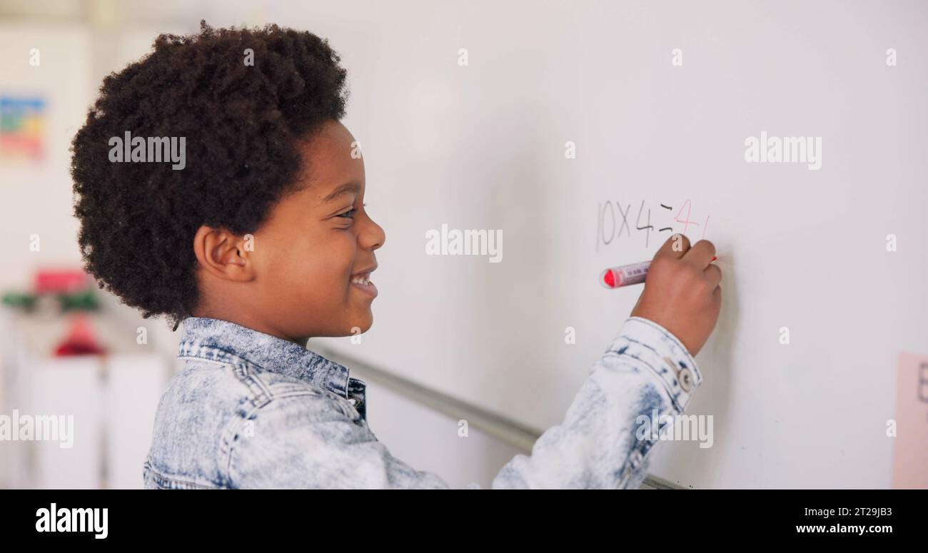 Math class, happy child at board for education, learning and problem ...
