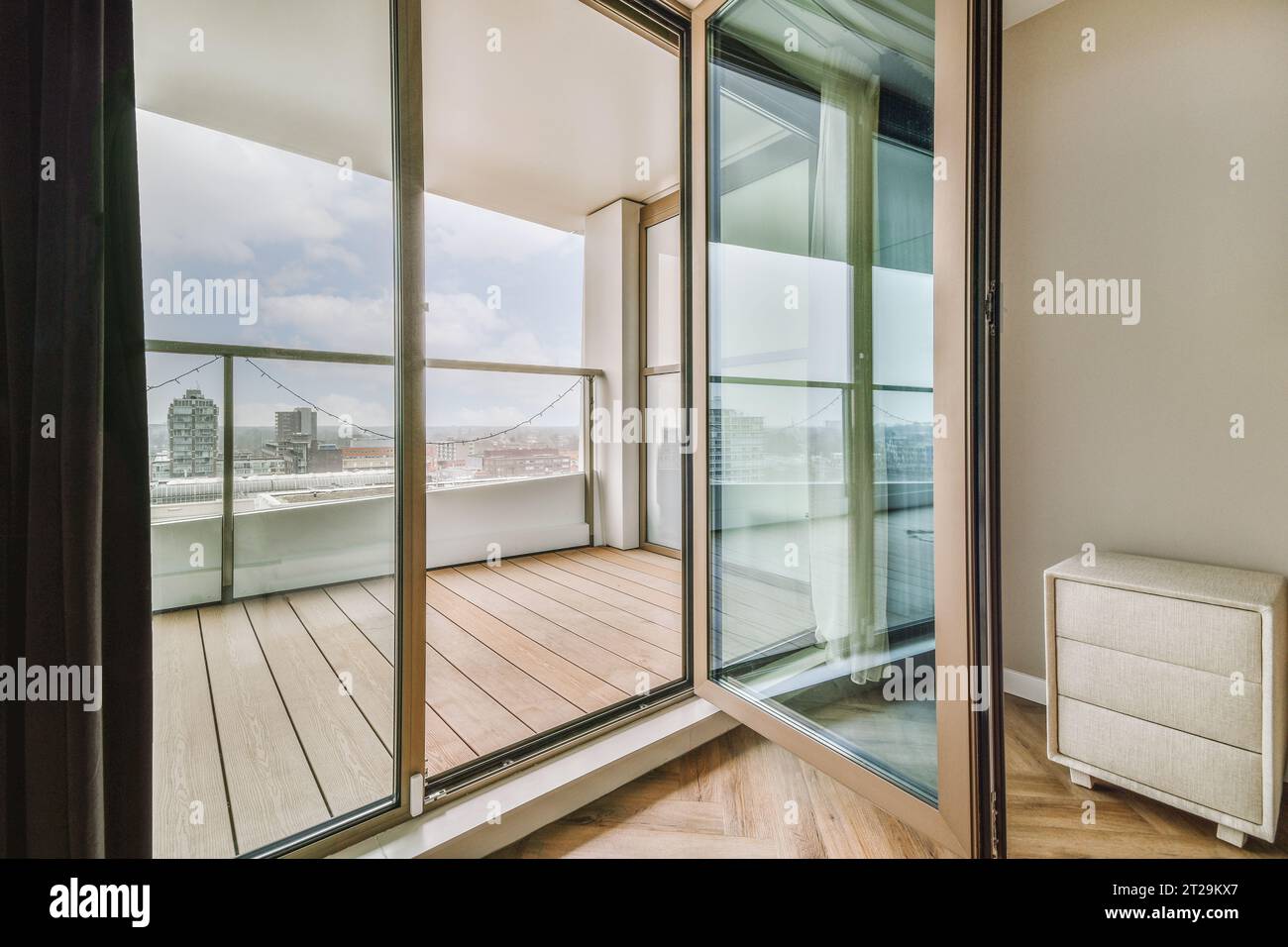 Open doors leading to the balcony hi-res stock photography and images ...