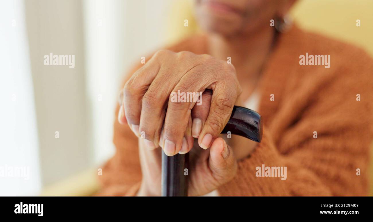 Hands, walking stick and senior woman with a disability, dementia or ...