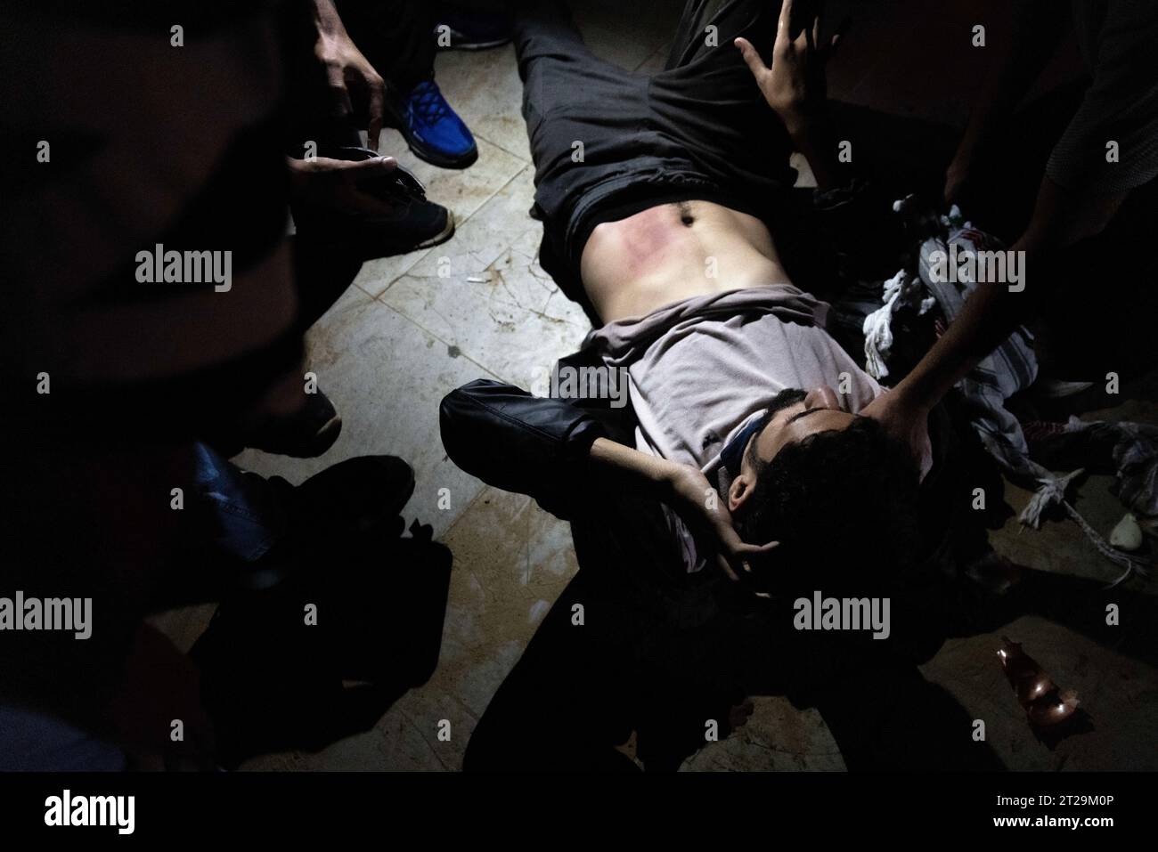 Awkar, Lebanon. 18th Oct, 2023. An injured demonstrator who was shot by ...