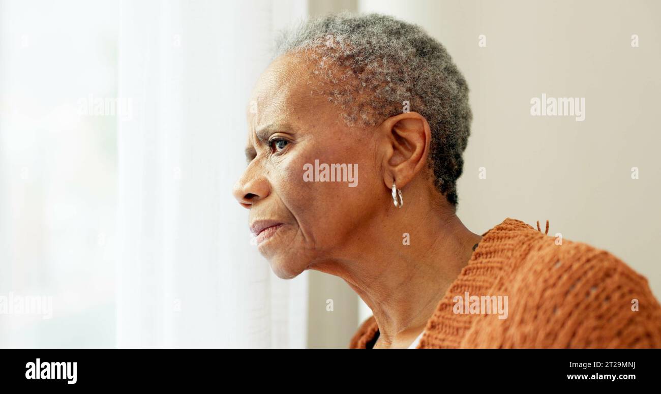 Senior woman, face and thinking by window at home to remember memory ...
