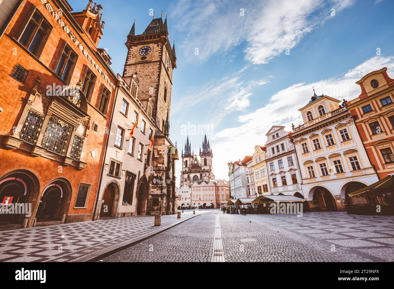 Fantastic scene of the town Hall and Tyn Church in sunlight. Popular ...