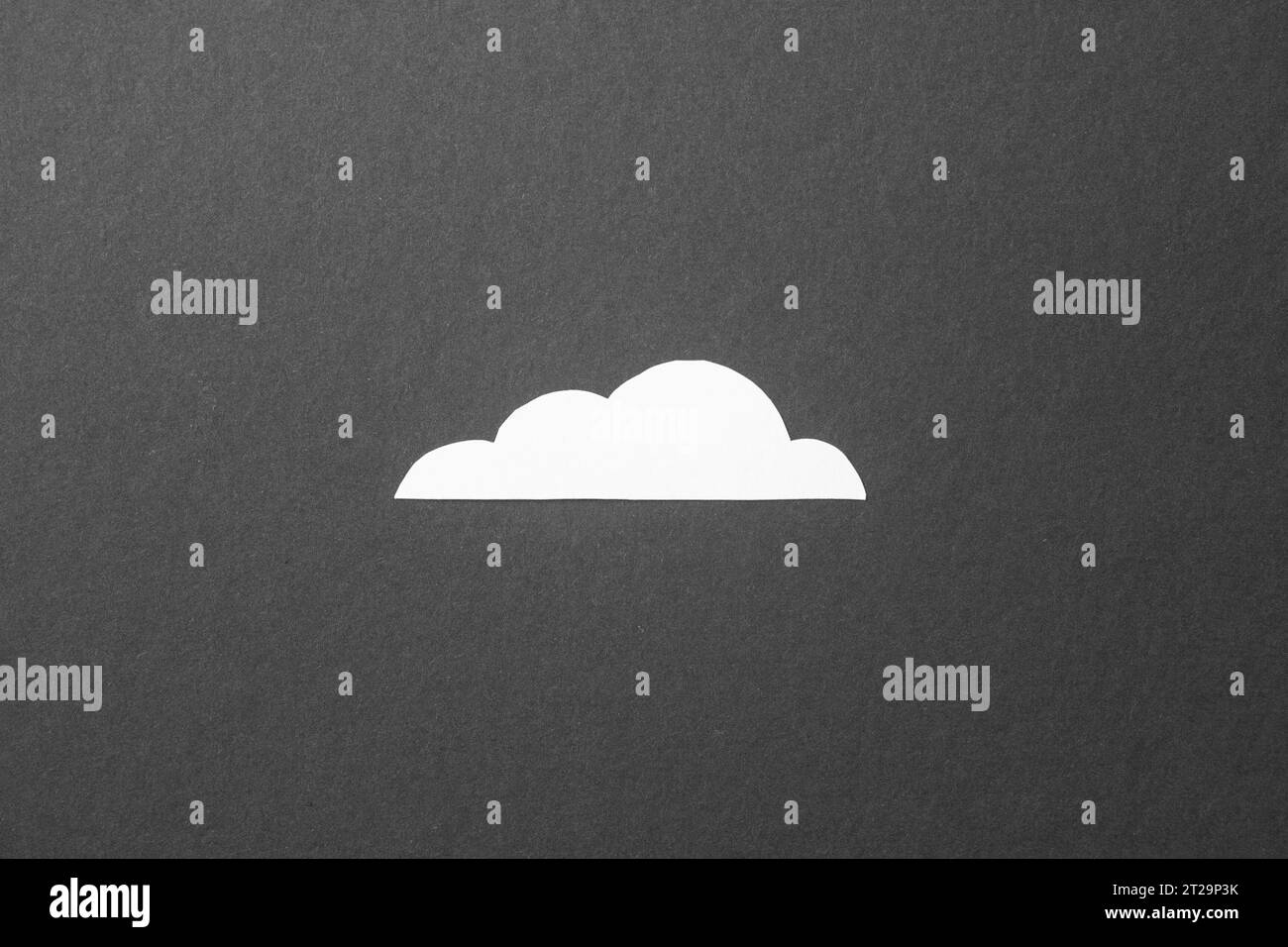 White cut out paper cloud on black background Stock Photo - Alamy