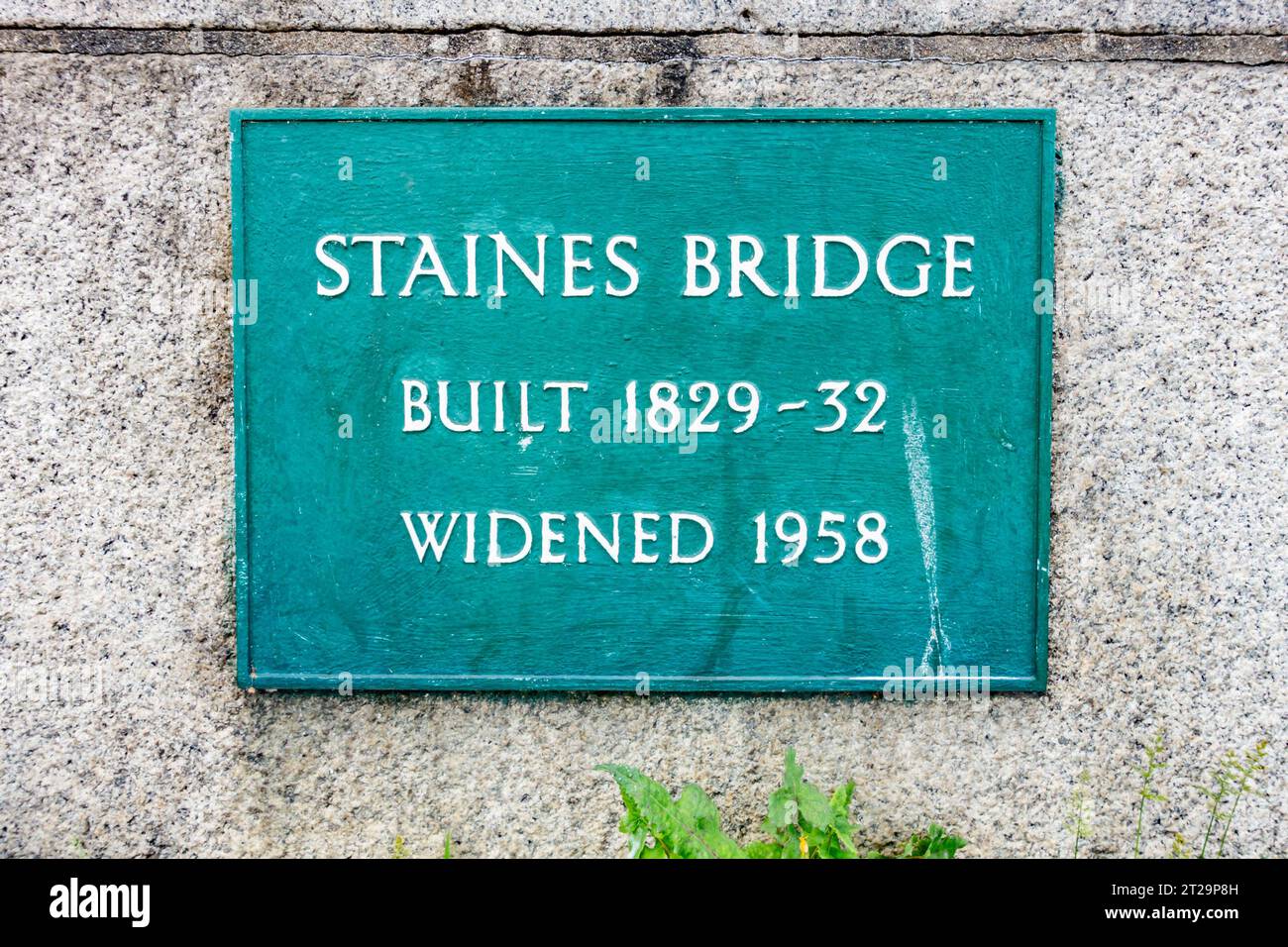 A sign on the side of Staines Bridge giving dates of when it was ...
