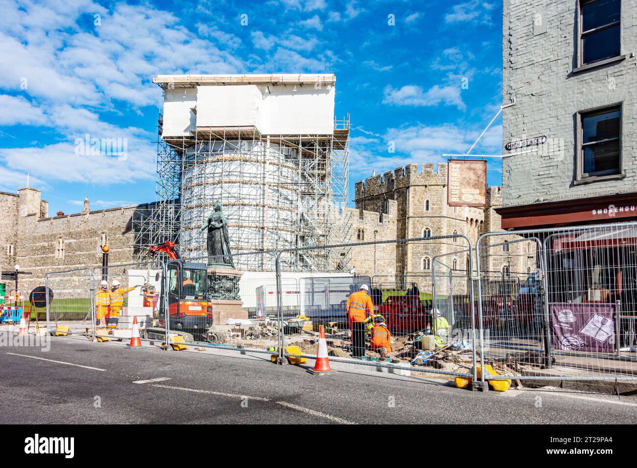 Roadworks outside Windsor Castle around the bronze statue of Queen ...