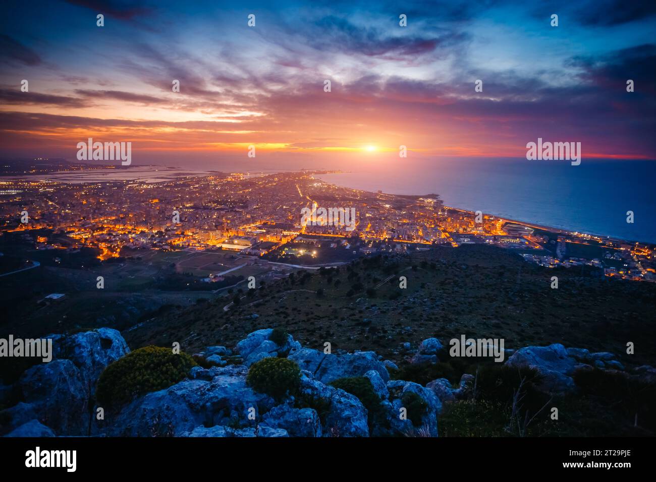 Top view above the city illuminated with lights. Dramatic and ...