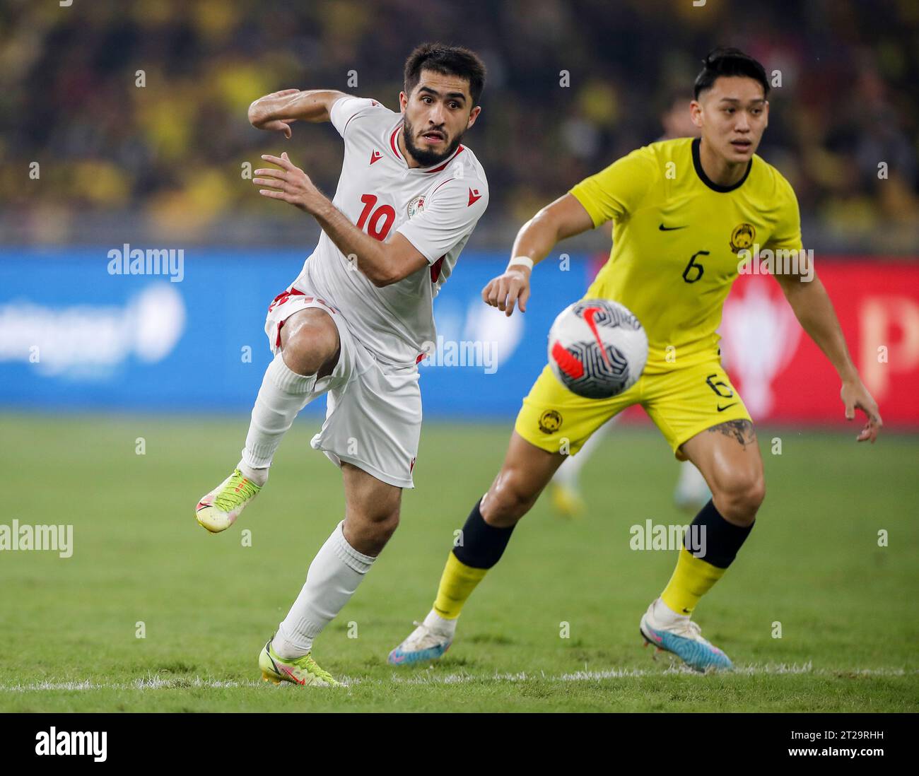 Kuala Lumpur, Malaysia. 17th Oct, 2023. Soirov Rustam of Tajikistan (L ...
