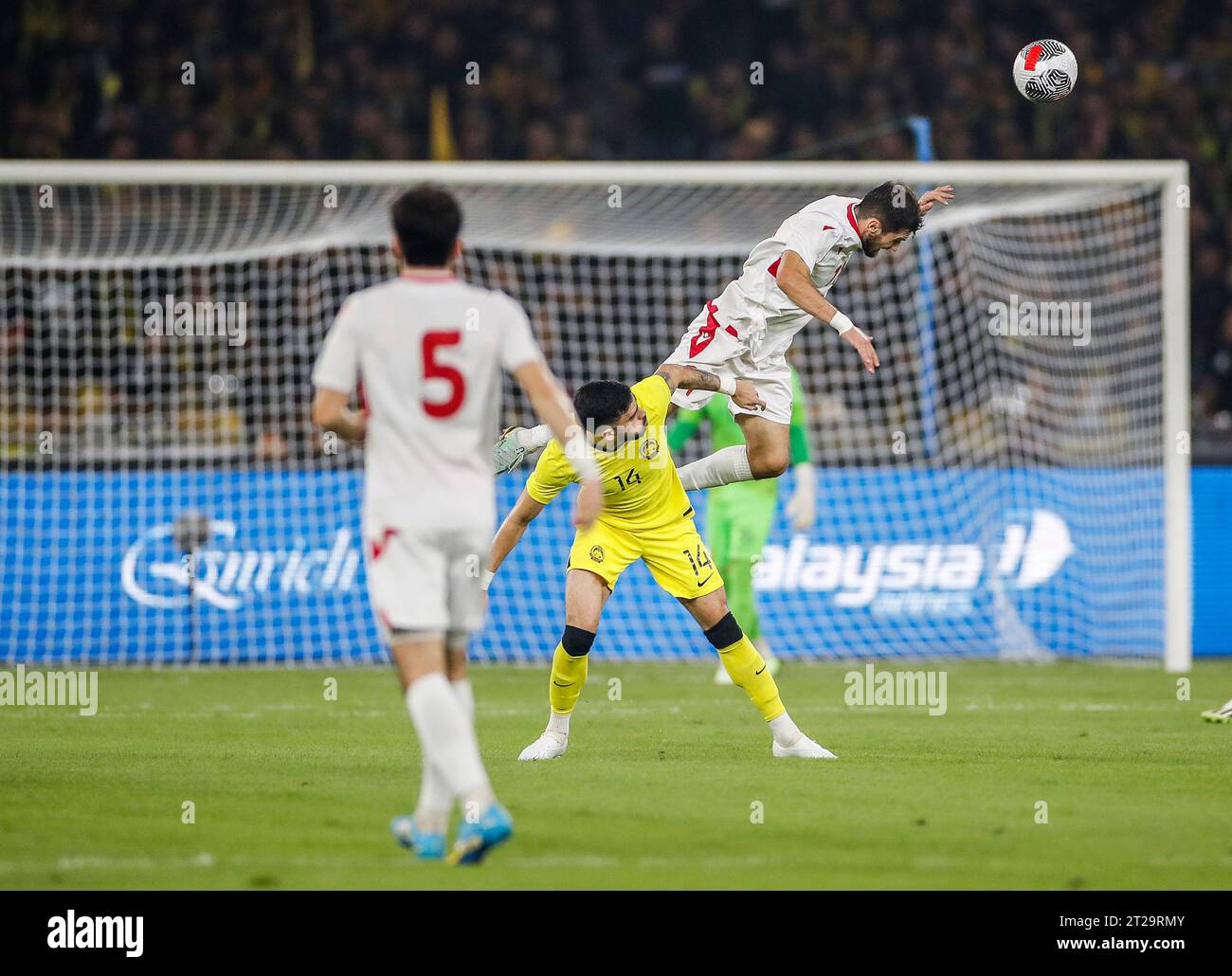 Kuala Lumpur, Malaysia. 17th Oct, 2023. Endrick Dos Santos of Malaysia (C) and Rahimov ...