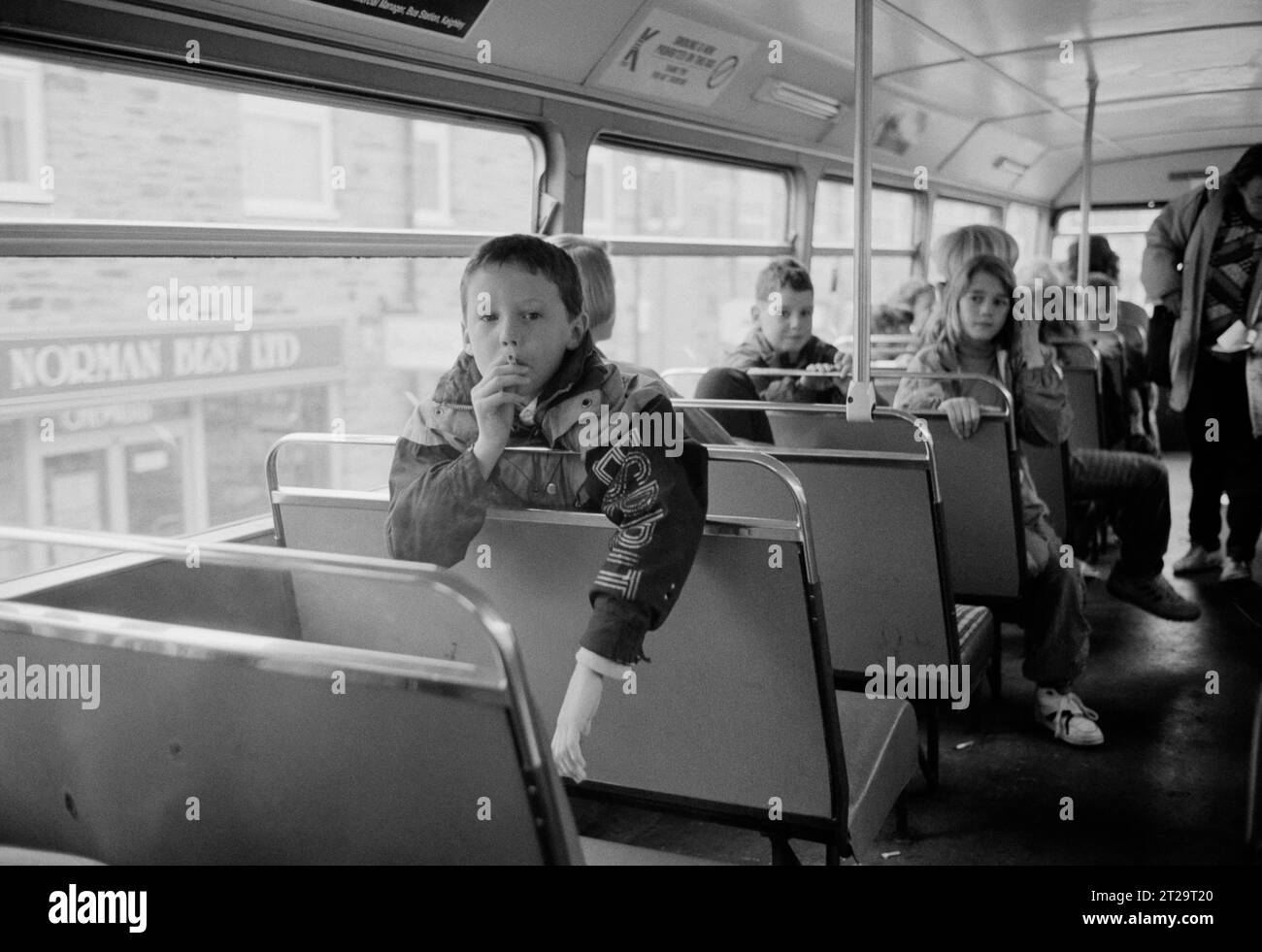© 2023 John Angerson. 1991 - Street picture from Bradford, young boy ...