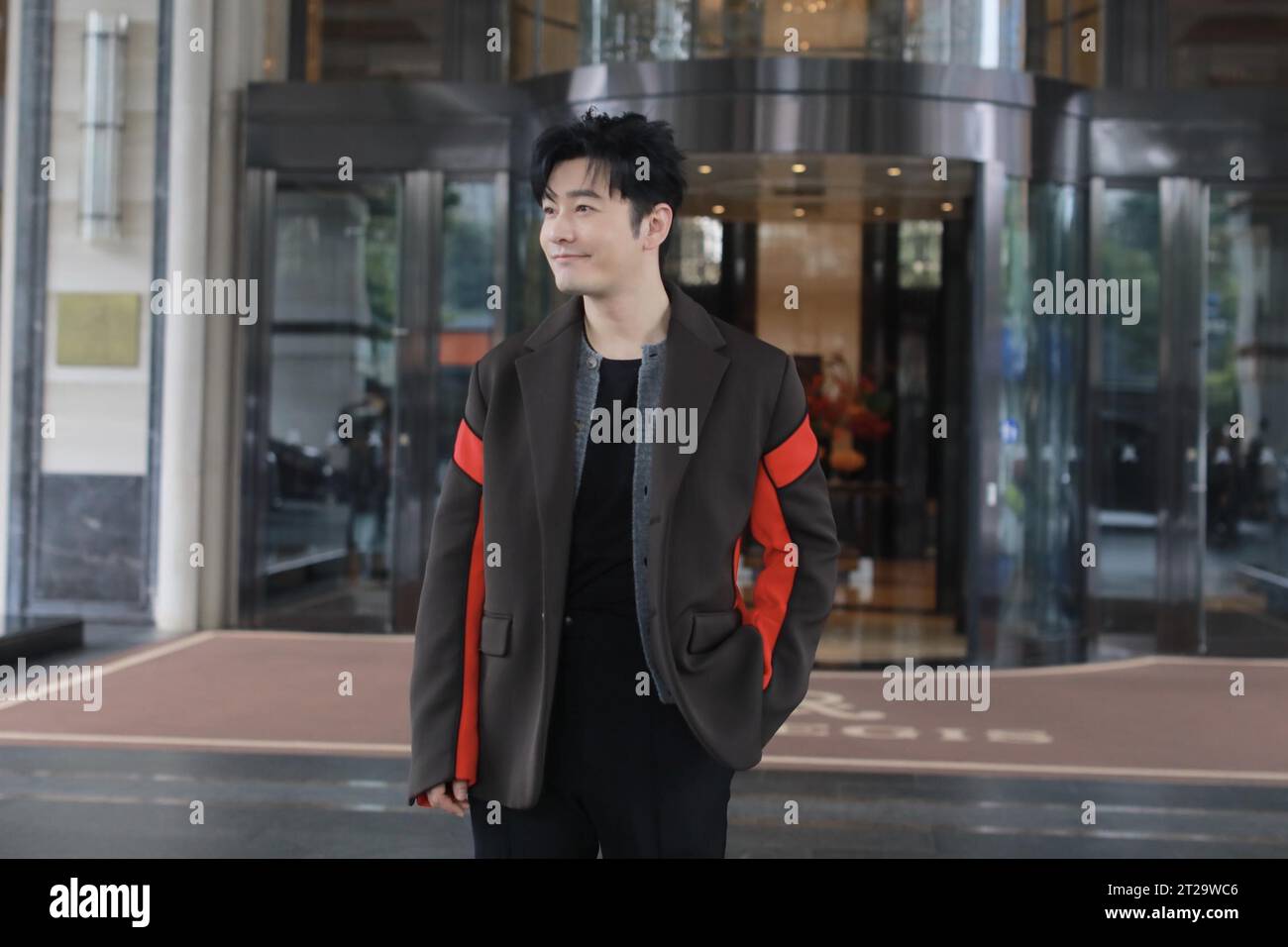 Chinese actor, singer, businessman, and model Huang Xiaoming appears at ...