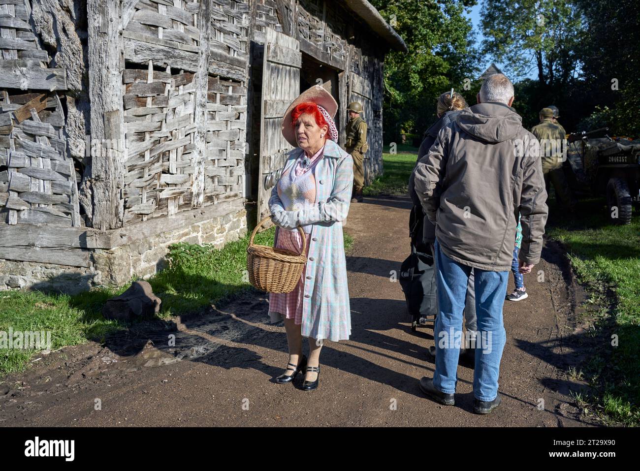 Woman 1940s vintage dress at the 1940s exhibition, Avoncroft Museum, Bromsgrove, England UK ...
