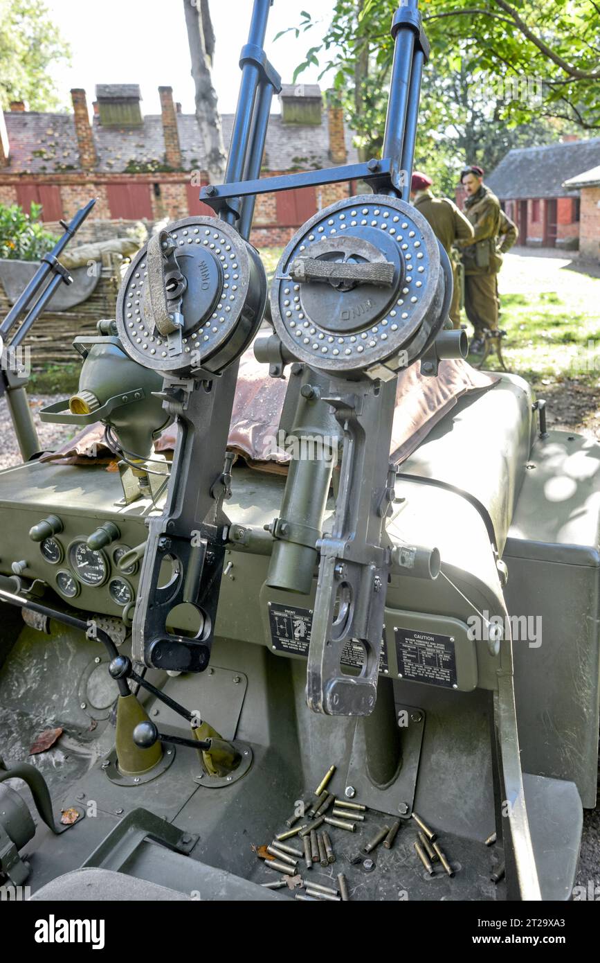 Mounted Machine guns and spent cartridges on a 1940s world war 2 British army vehicle. Avoncroft ...