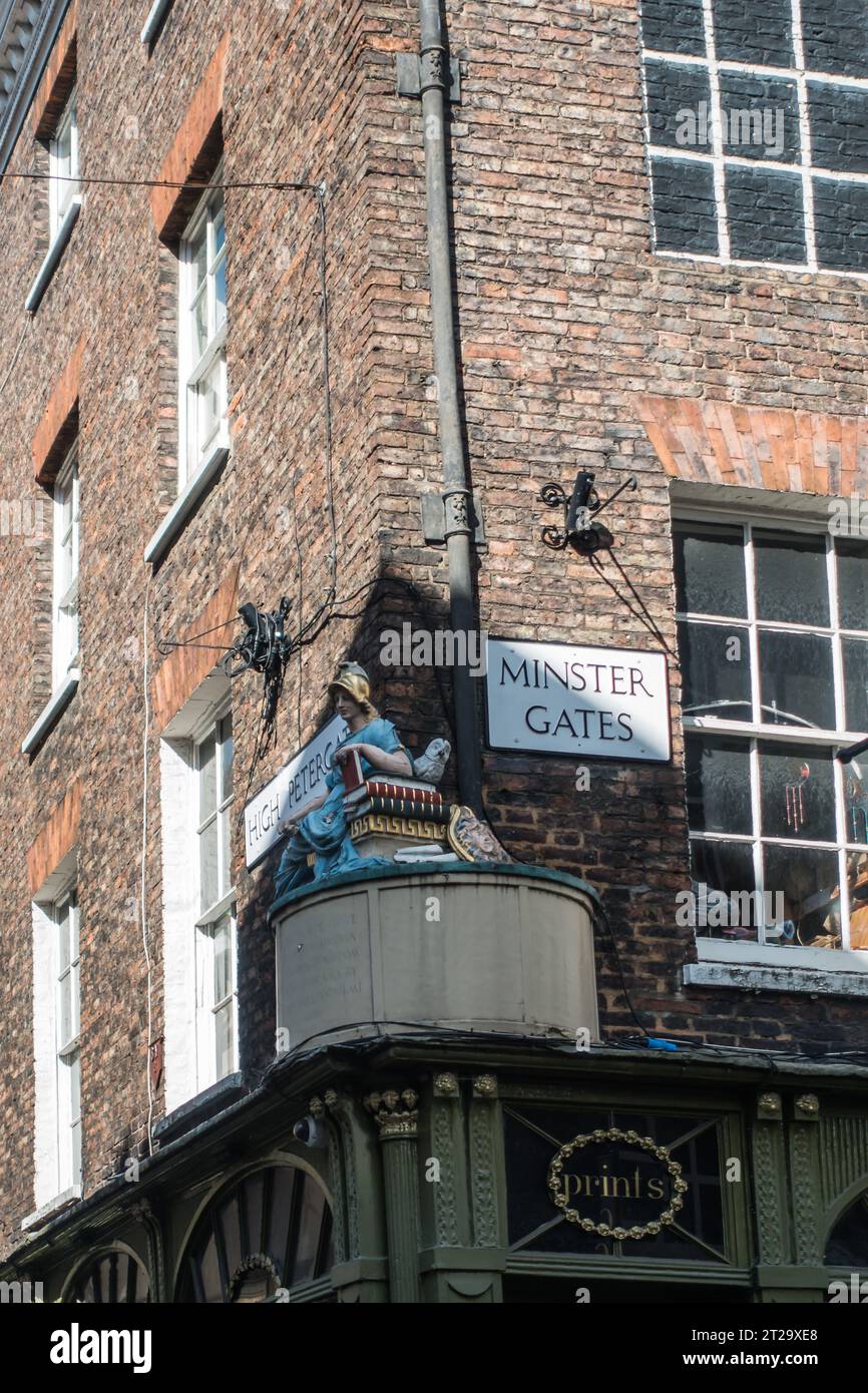 Sculpture of Minerva, Goddess of Wisdom and Drama on the corners of ...