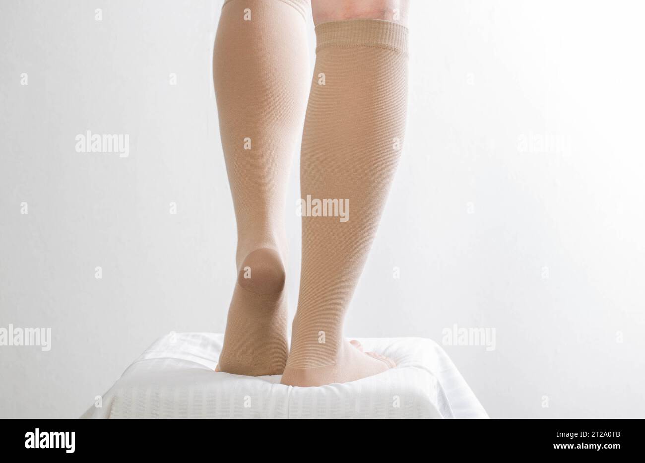 Female legs in compression stockings for varicose veins on the legs ...