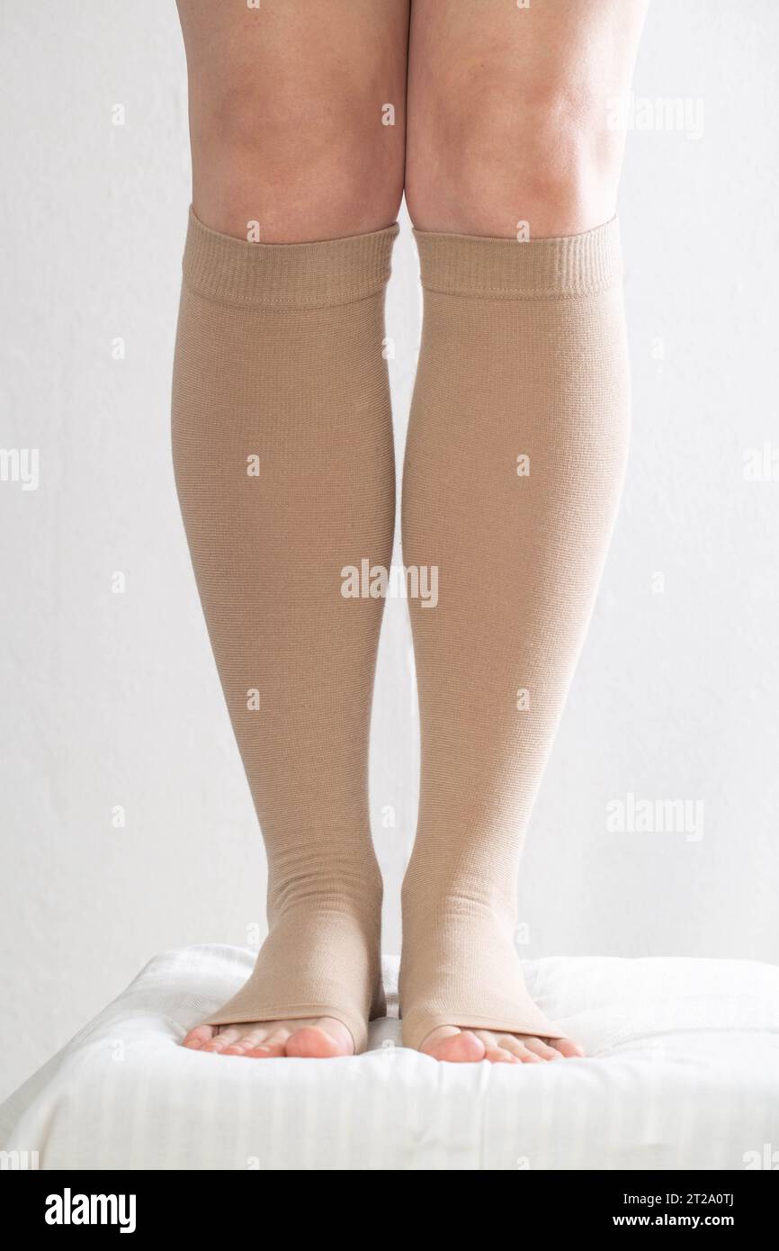 Female legs in compression stockings for varicose veins on the legs ...