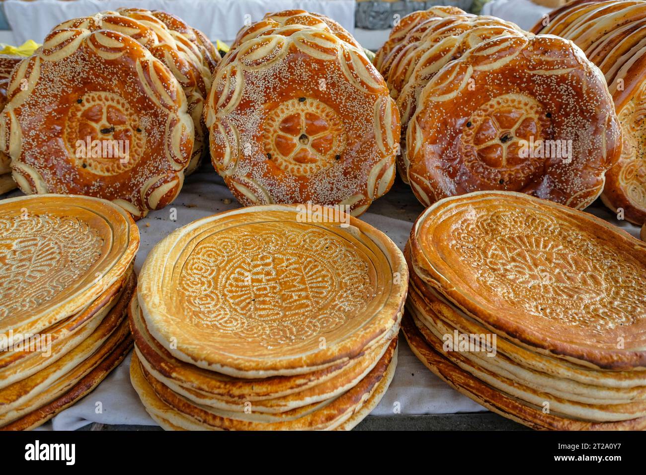 Shelf full of bread at the City Market in Fergana, Uzbekistan Stock ...
