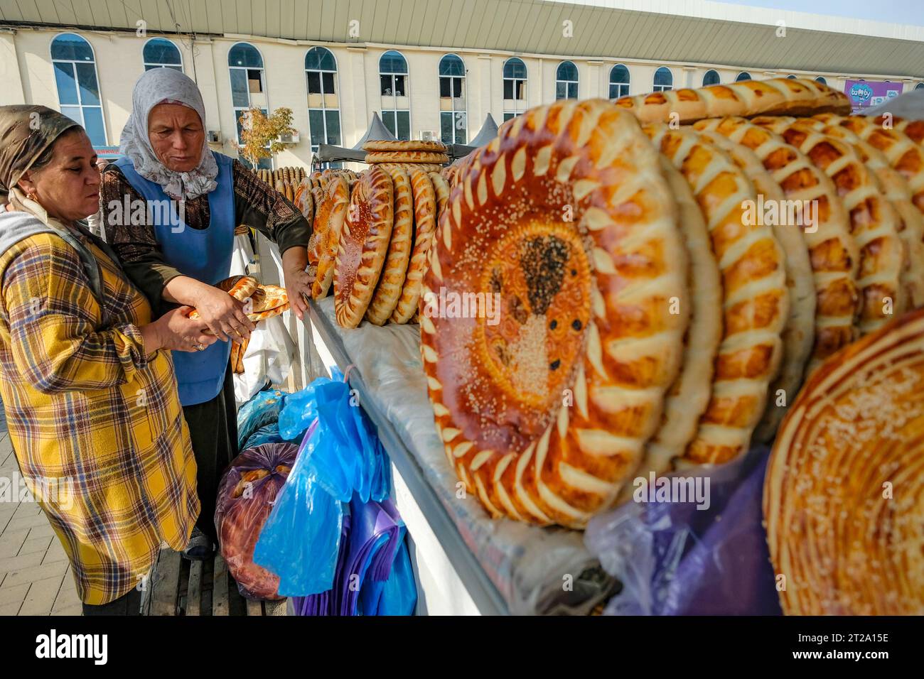 Fergana, Uzbekistan - October 18, 2023: A bread seller at the City ...