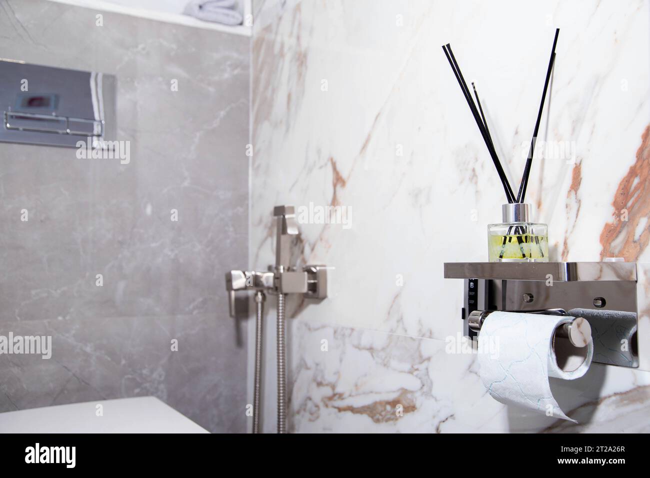 Aroma diffuser for a pleasant smell in the toilet against the backdrop ...