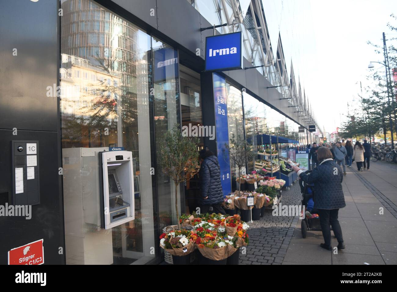 Copenhagen, Denmark /18 October. 2023/.Shopers and people walk b y Irma ...