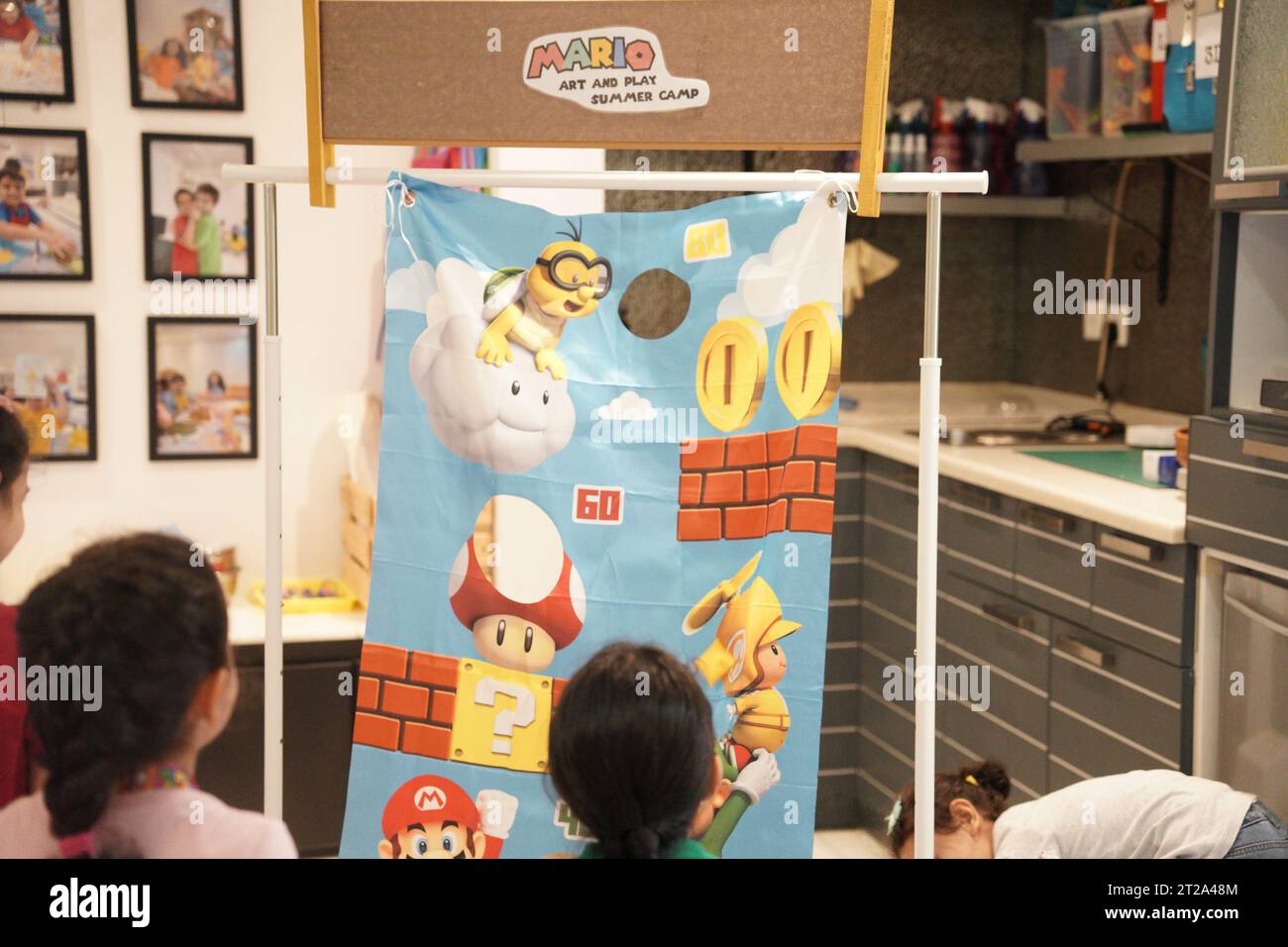 Kids playing Super Mario Bros Movie Bean Bag Toss Game-Throwing ...