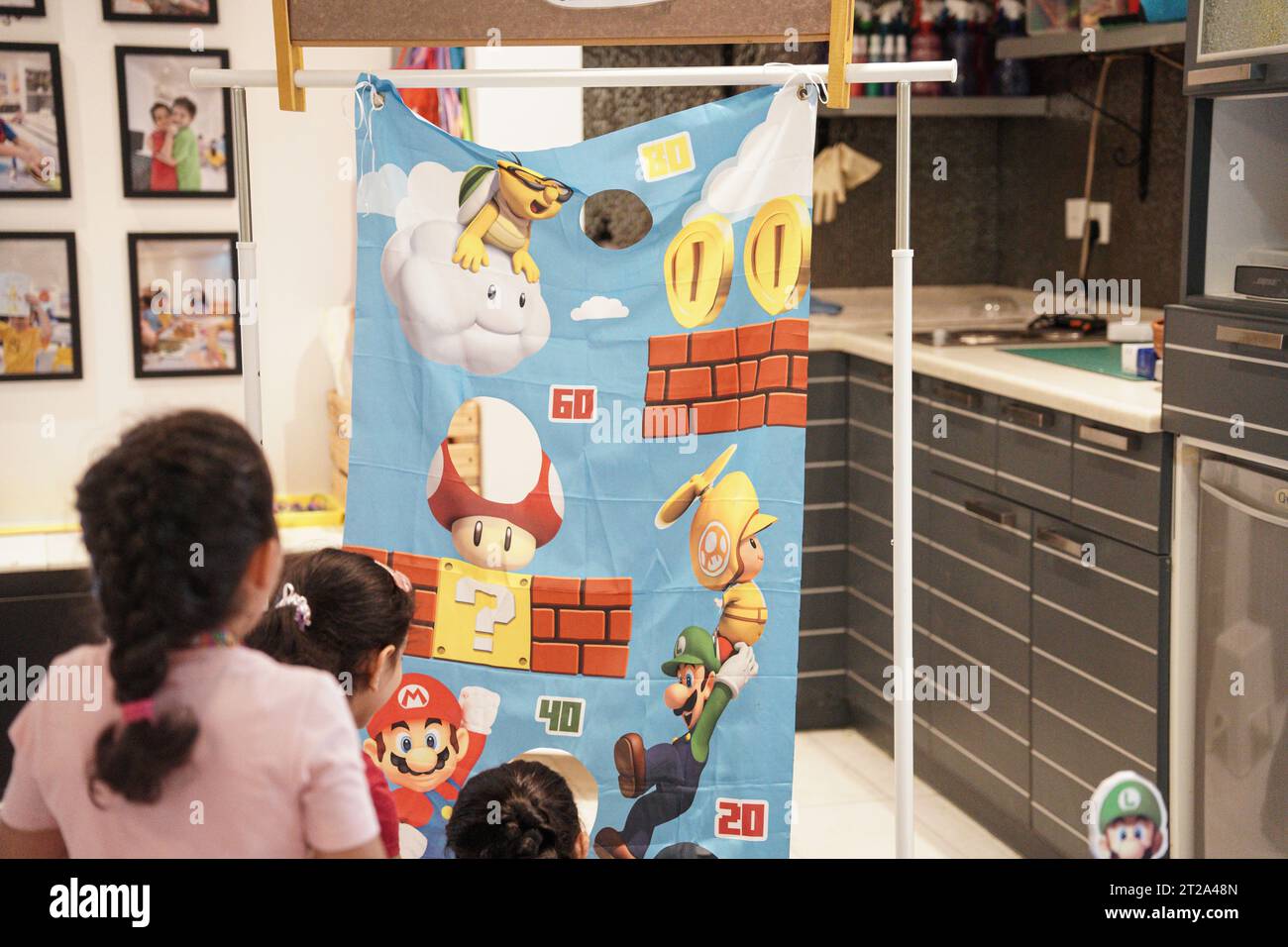 Kids playing Super Mario Bros Movie Bean Bag Toss Game-Throwing ...