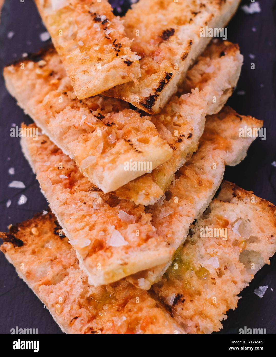 Toasted bread with tomato, typical of the Catalan region Stock Photo ...