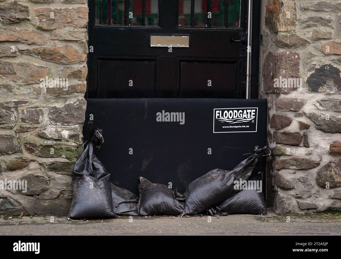 Sand bags sit in a doorway in Aberfoyle in Perthshire. Aberfoyle was ...