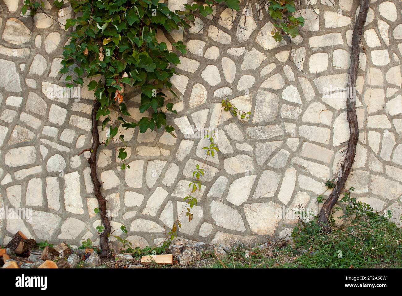 Stone texture on a wall in Montenegro. An ancient gray stone wall with ...