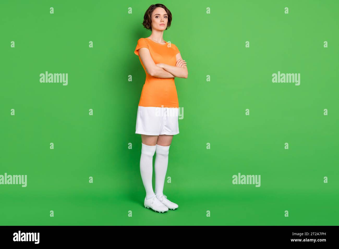 Full size profile photo of half turned person folded arms look camera ...