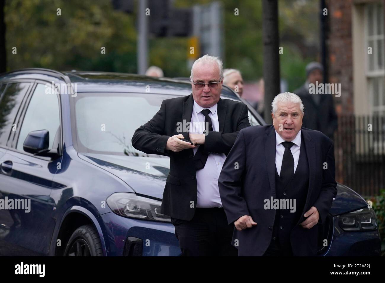 John Linehan (front) arrives for the funeral of Olympic medallist boxer ...