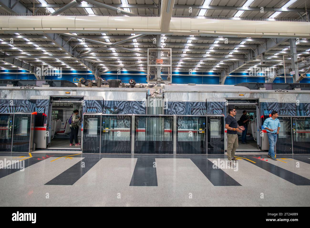Media personnel are recording a video of a high-speed train from the ...