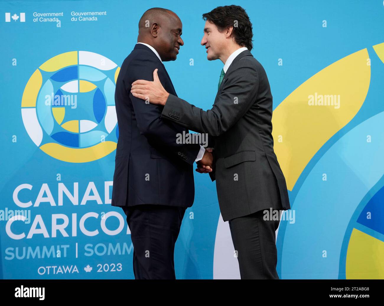 Prime Minister Justin Trudeau greets Dominica Prime Minister Roosevelt ...