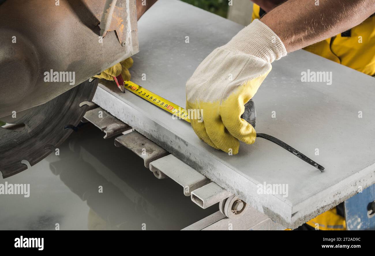 Contractor Worker Taking Measurement Before Concrete Block Cut Close Up ...