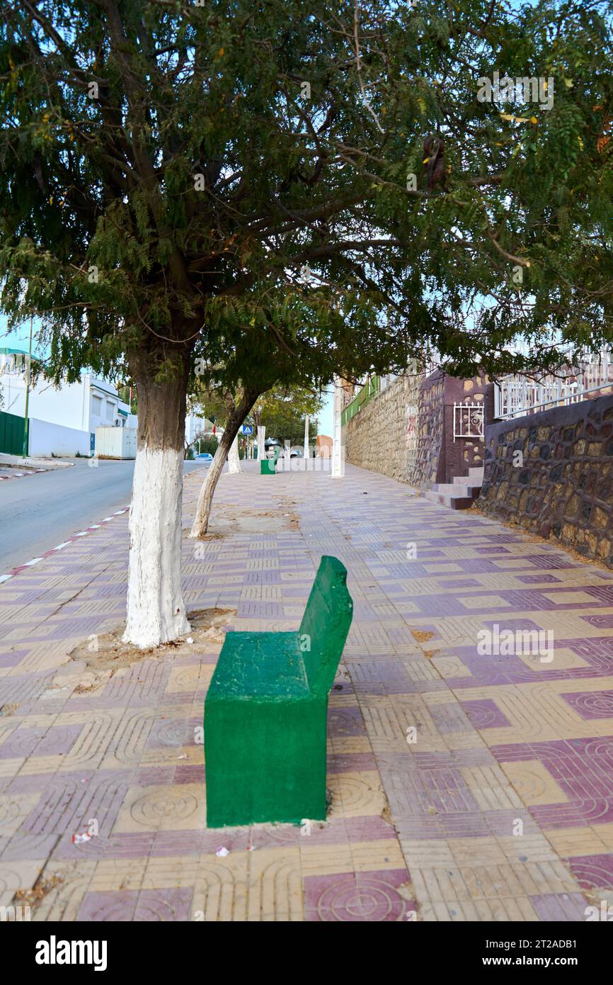 bench in the old town street Stock Photo - Alamy