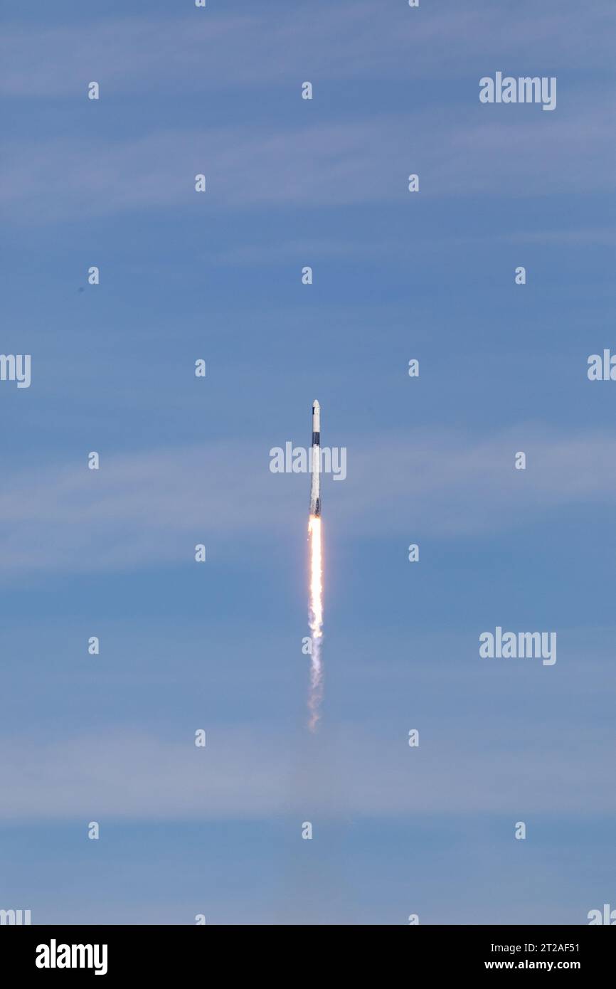 NASA/SpaceX CRS-26 Liftoff. A SpaceX Falcon 9 rocket soars upward after ...